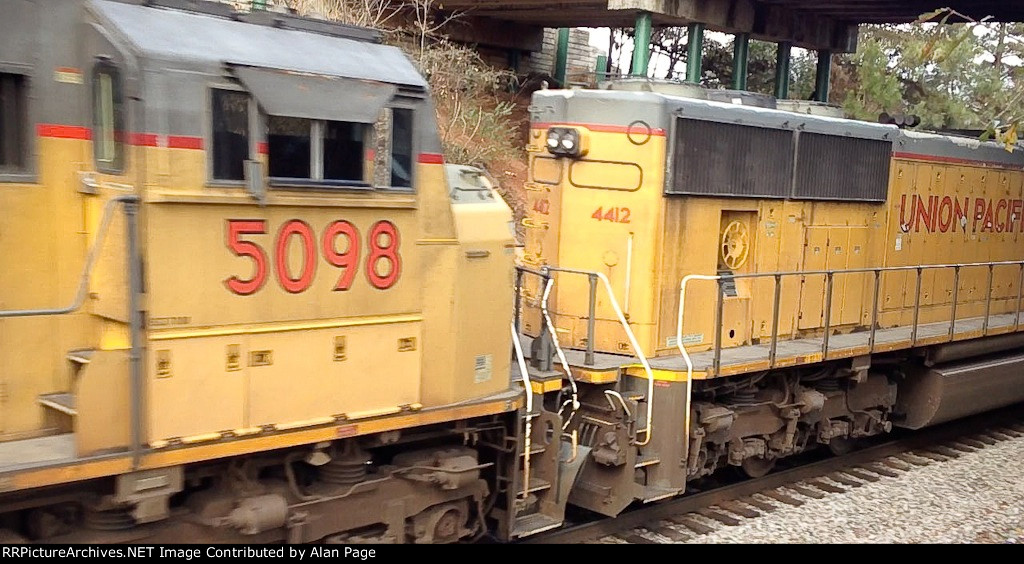 UP SD70Ms 4412 and 5098 roll under Mallory Rd